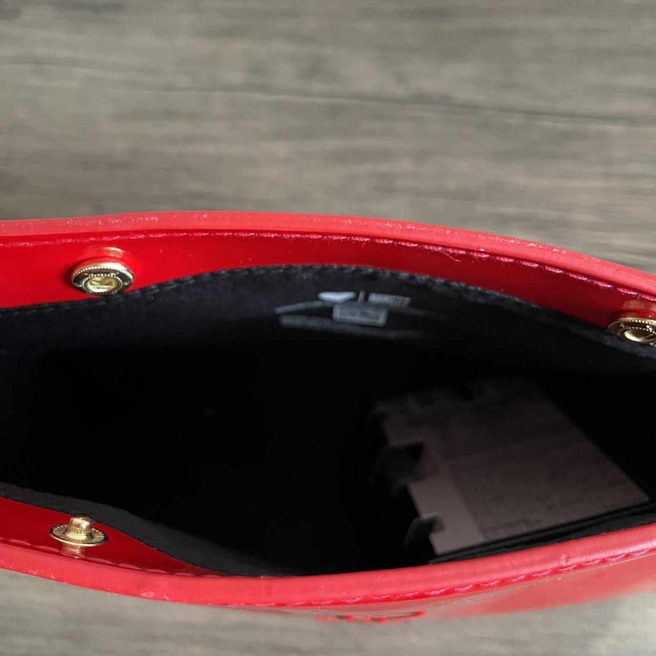 NIP: A red YSL beaute makeup pouch with YSL mon... - Depop