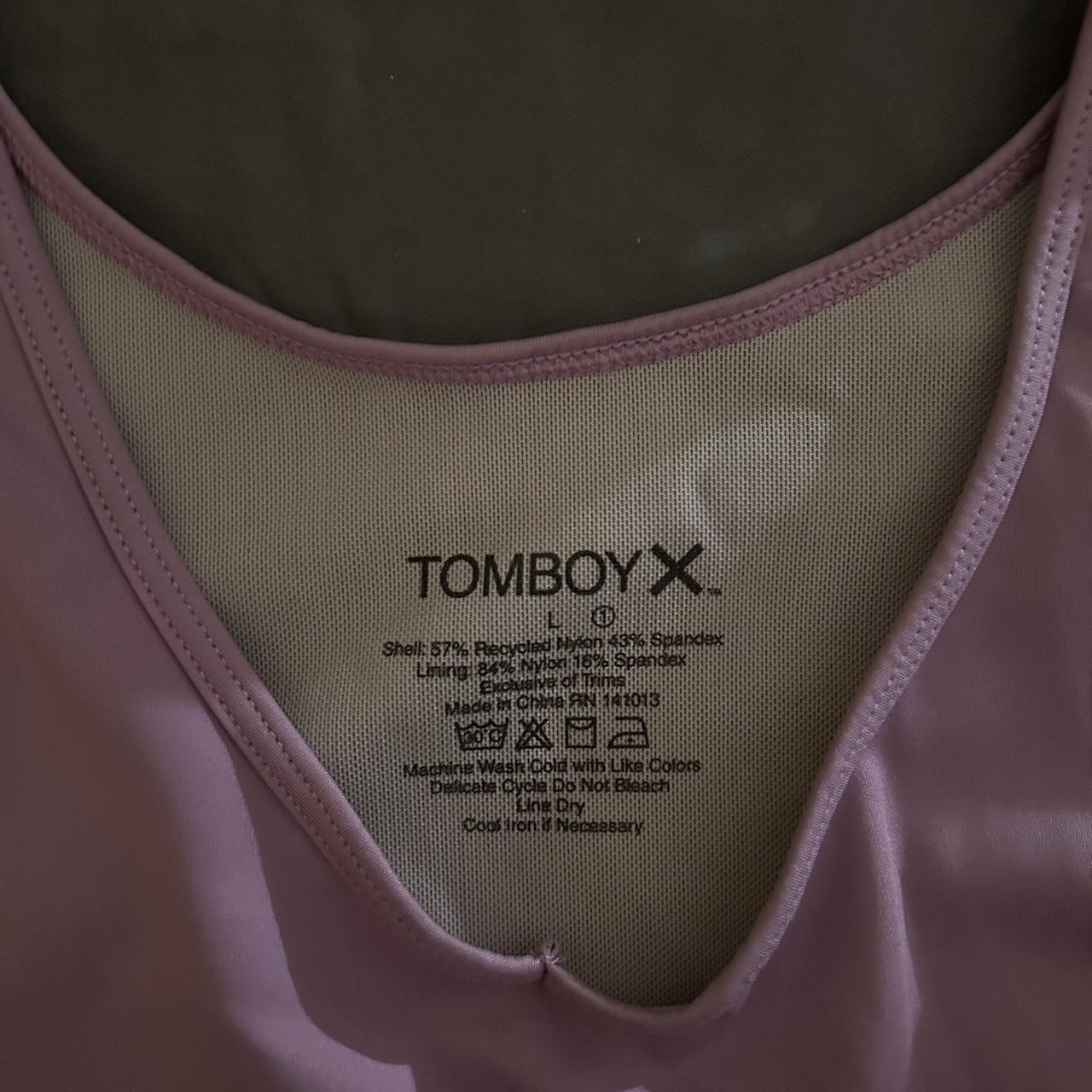 TOMBOYX compression bra workout top fits kinda like... | Depop
