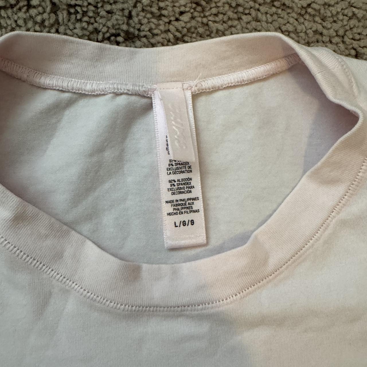 Light pink Skims cotton tee #skims Size: Large... | Depop