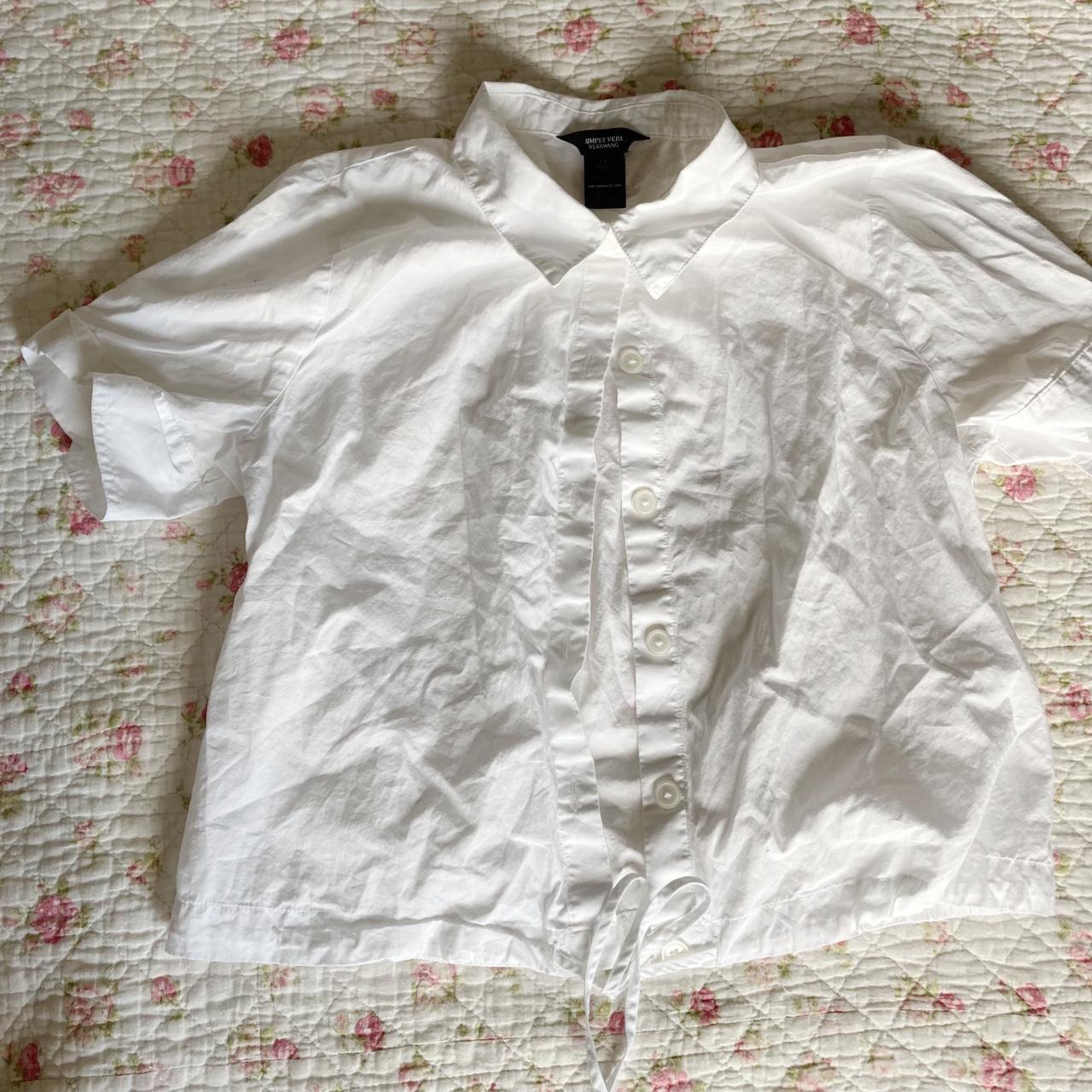 White button top with tie in the middle... | Depop