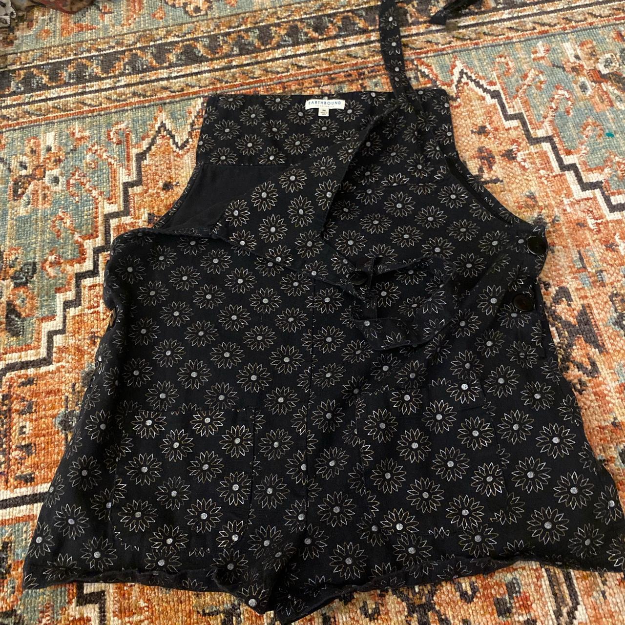 Black Earthbound overalls with metallic flower... - Depop