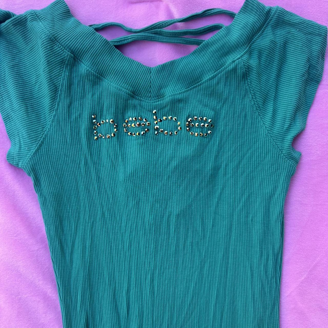 Teal Bebe Mini Dress – Features the iconic silver... | Depop