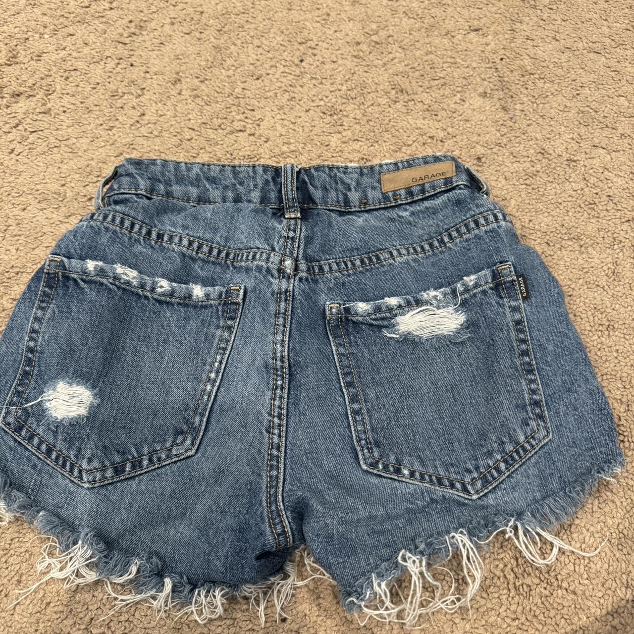 Garage blue ripped jean shorts - Depop