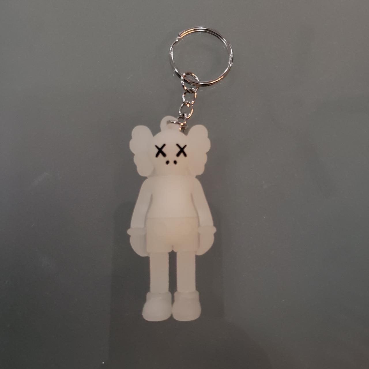 Kaws Skull Keychain Figure glow in the dark - Depop
