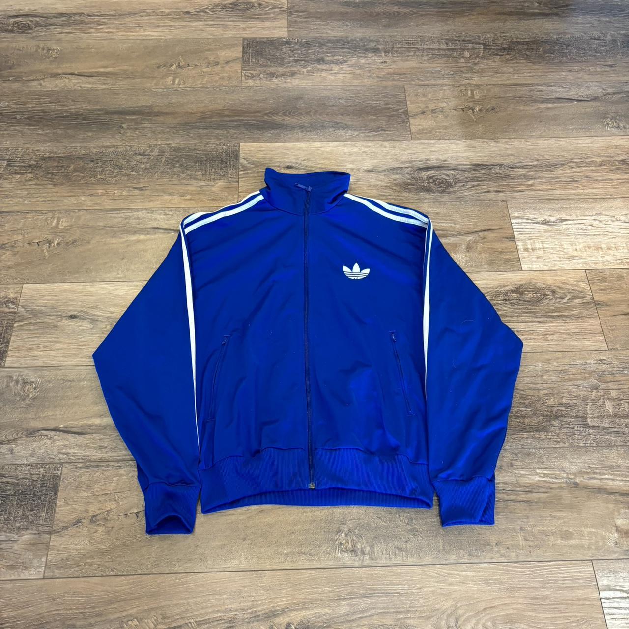 Blue Adidas track jacket with embroidered logo... - Depop