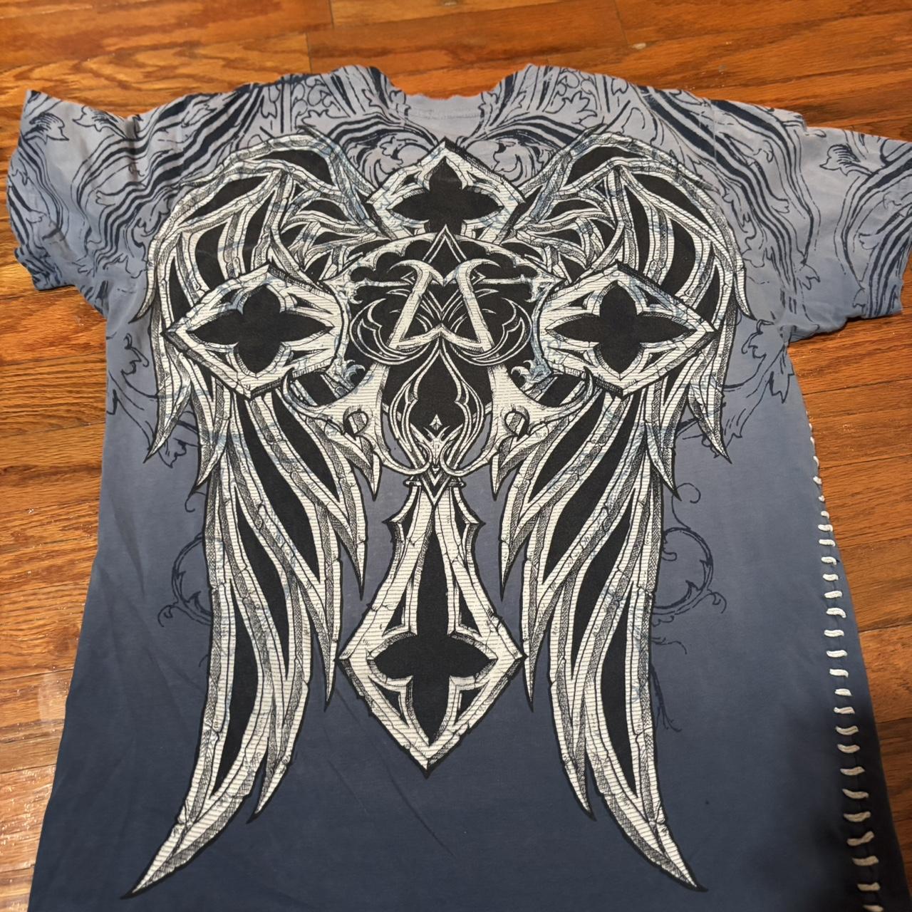 Affliction blue and black shirt Small hole in front... | Depop