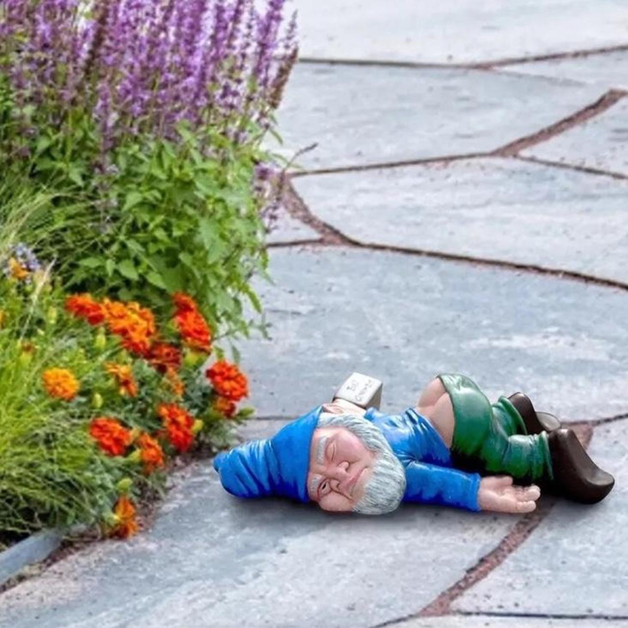 3D gnome laying down on the ground - a fun... - Depop