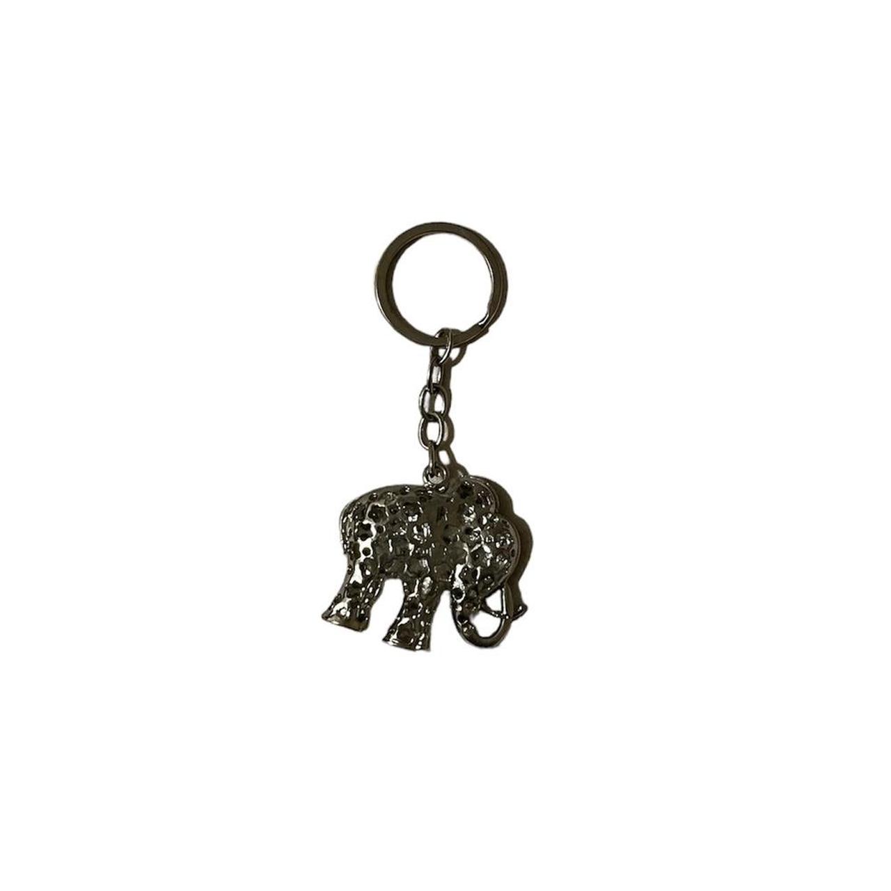 Silver and blue metal elephant keyring Message me... - Depop