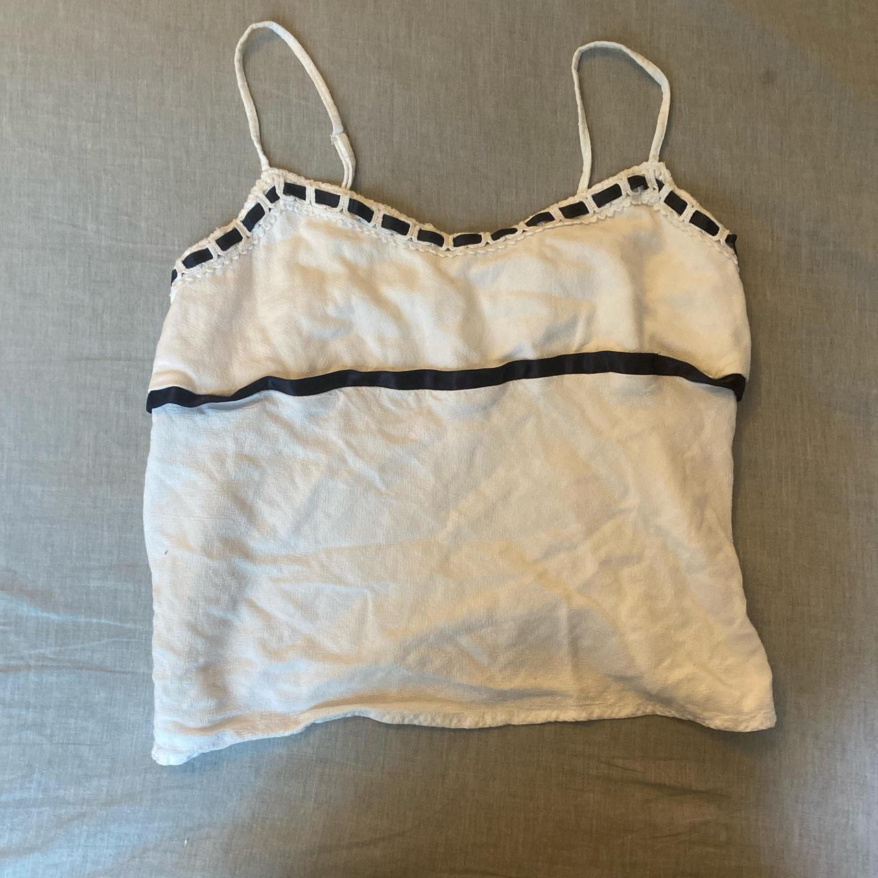subdued black and white tank top bottom half is... | Depop