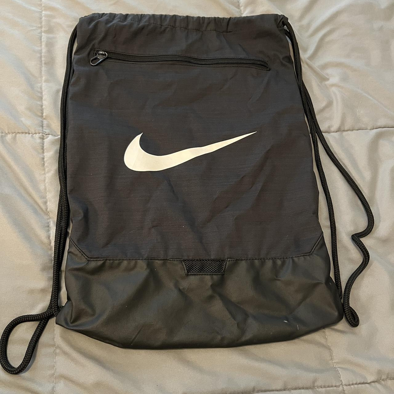 Nike drawstring backpack 🎒 Black with white... - Depop
