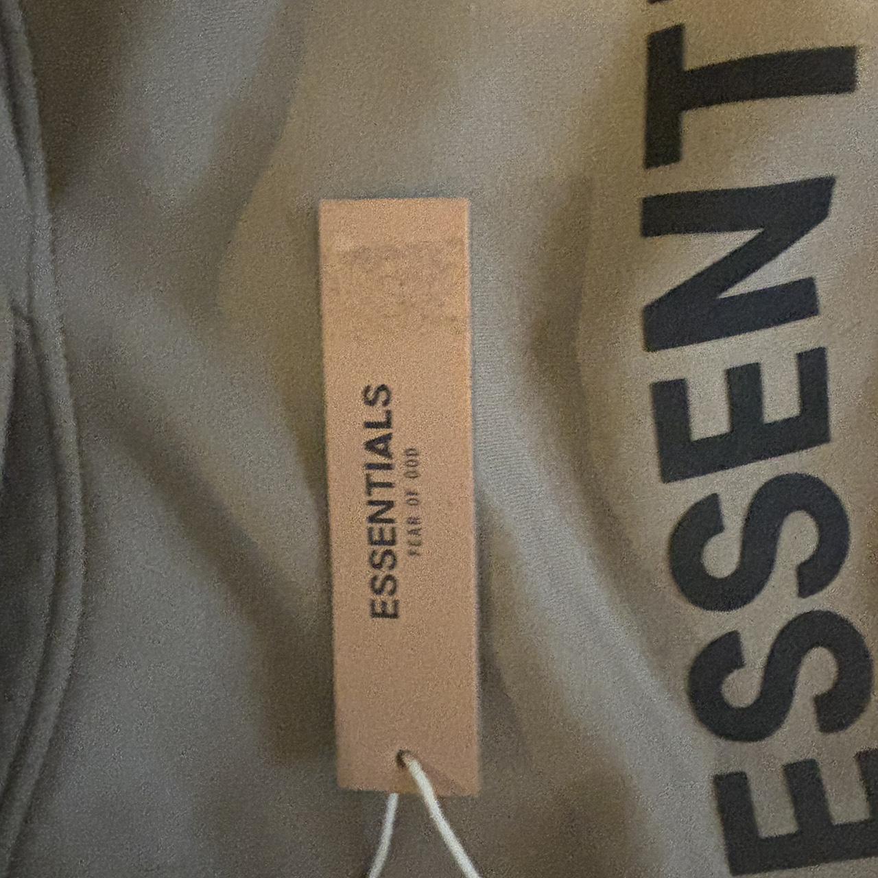 Fear of God Essentials tan hoodie Small stain not... - Depop
