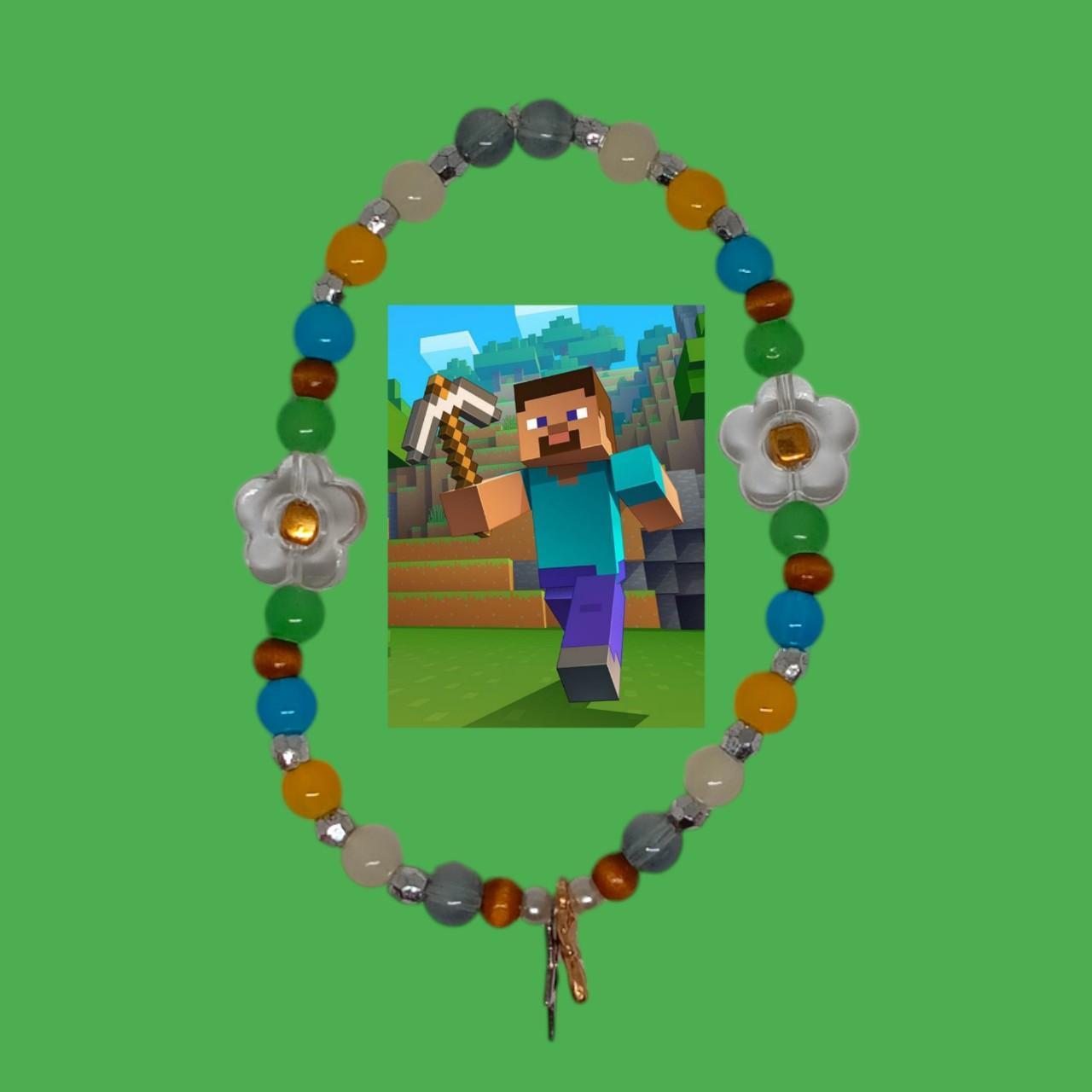 A single Minecraft bracelet. The colors come... - Depop