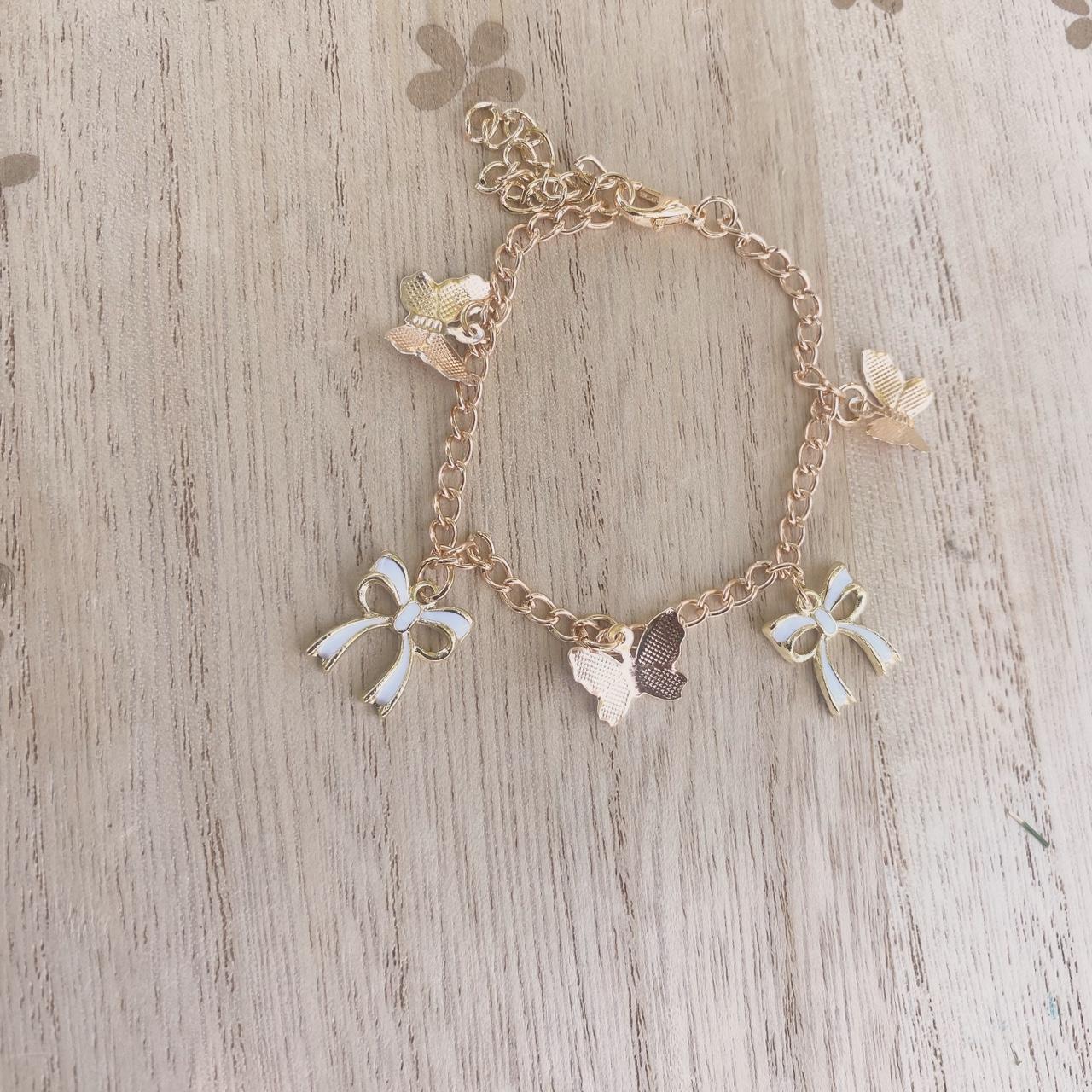Cute handmade gold tone bracelet with bow and... - Depop