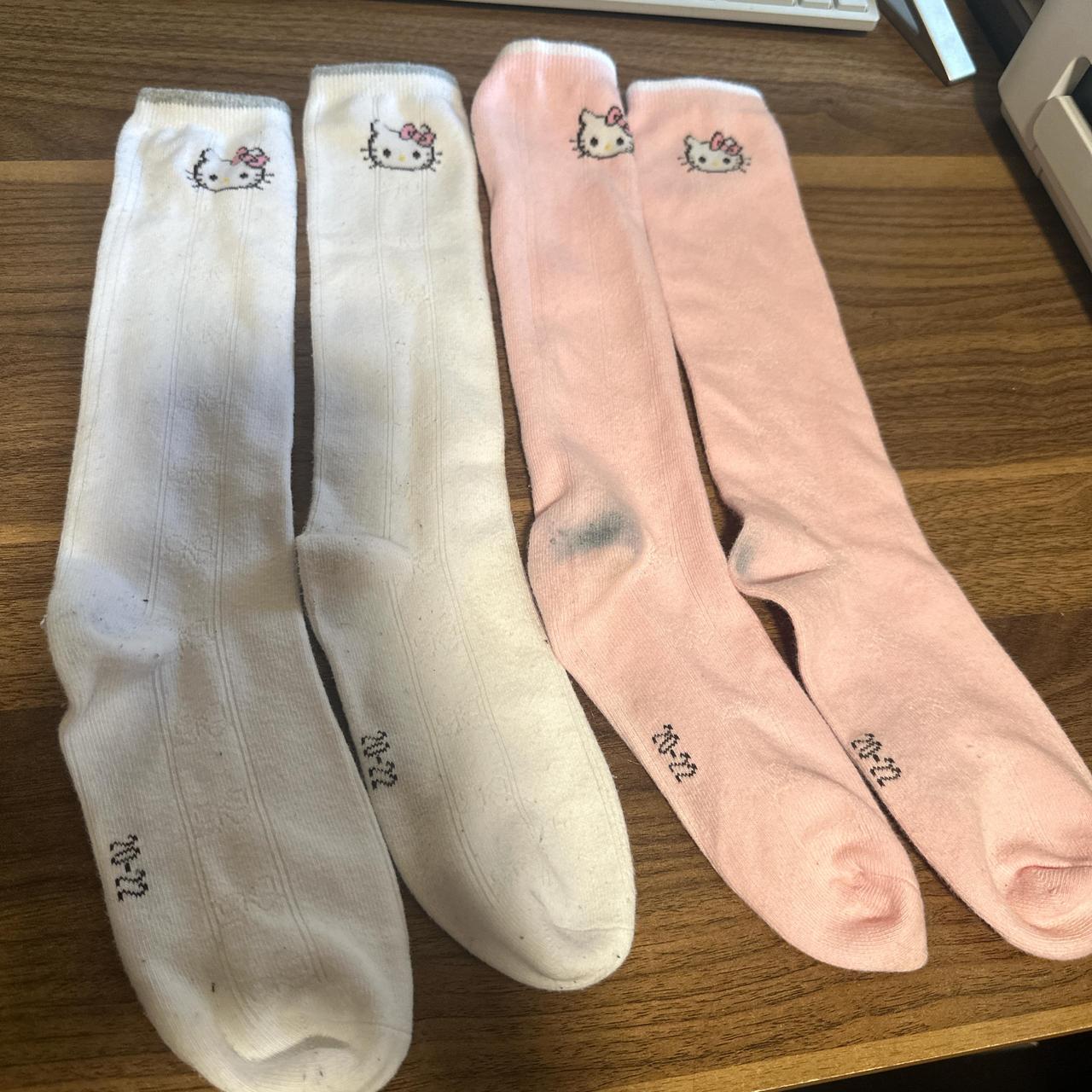 Hello Kitty high rise socks in fair condition. Pink... - Depop
