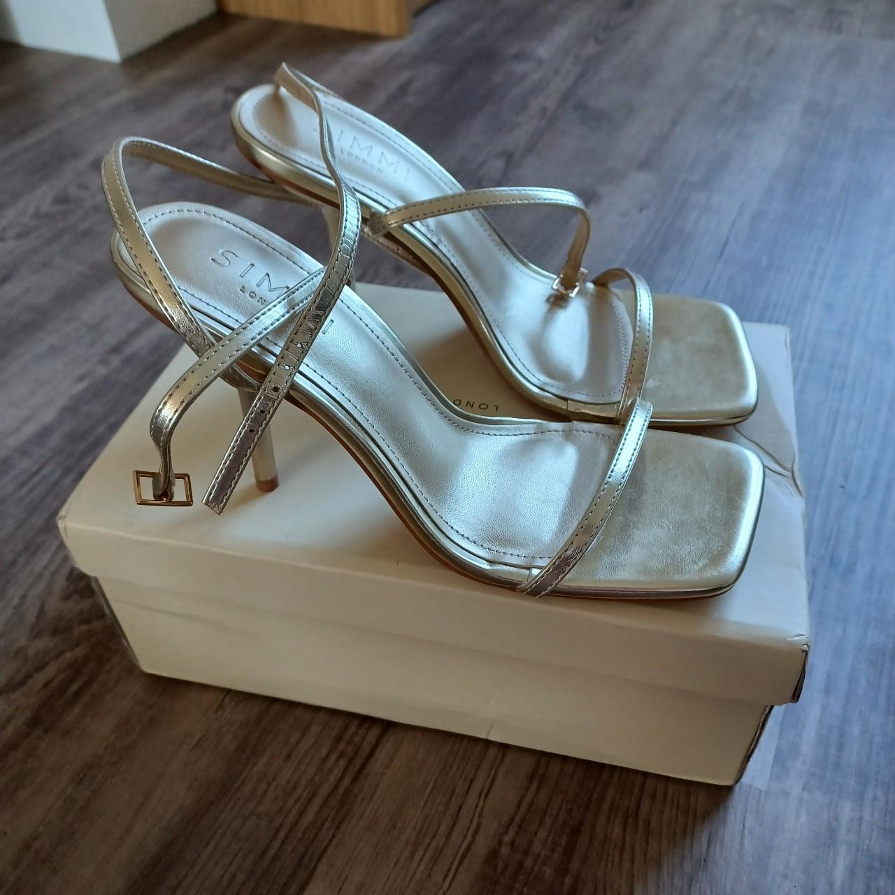 Simmi Women's Gold Sandals | Depop