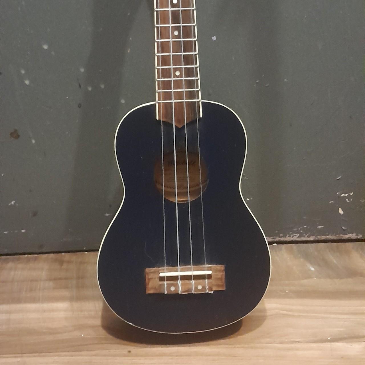 Slightly used ukulele navy blue with all its strings... - Depop