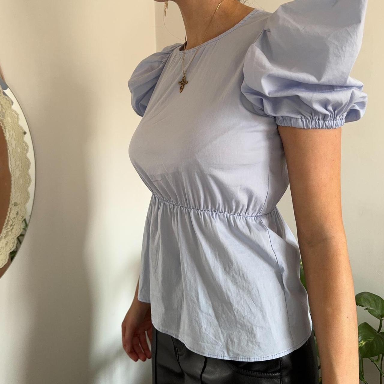 Pastel blue balloon sleeve peplum top... - Depop