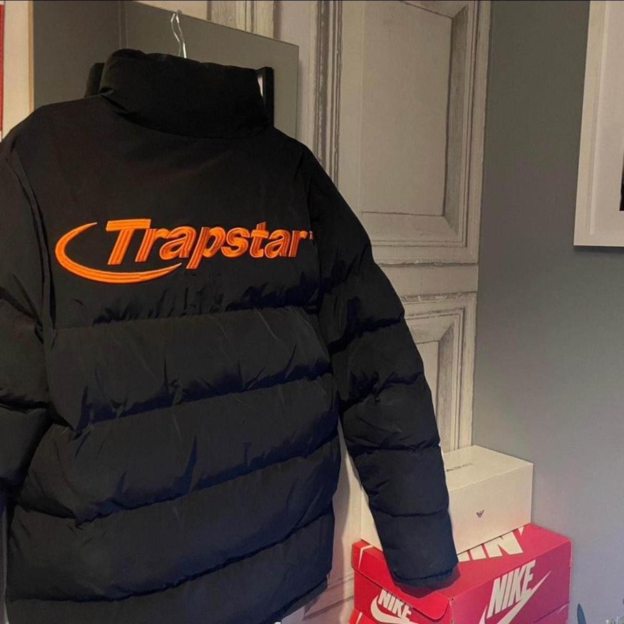 black and orange trapstar puffer in great condition... - Depop