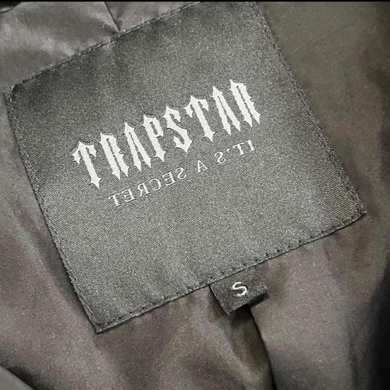 black and orange trapstar puffer in great condition... - Depop