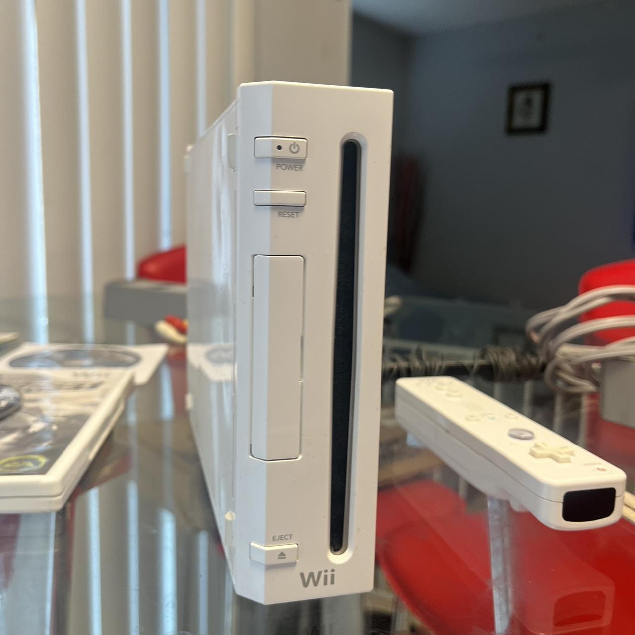 Used wii has two games spider edge of time and Sonic... - Depop