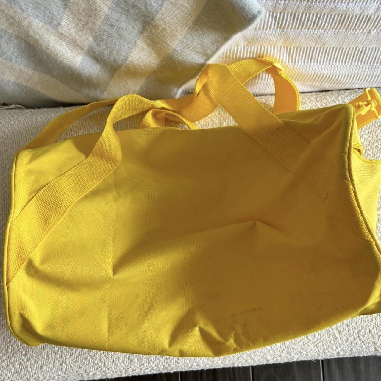 Glossier yellow travel duffle! Super cute and can... - Depop