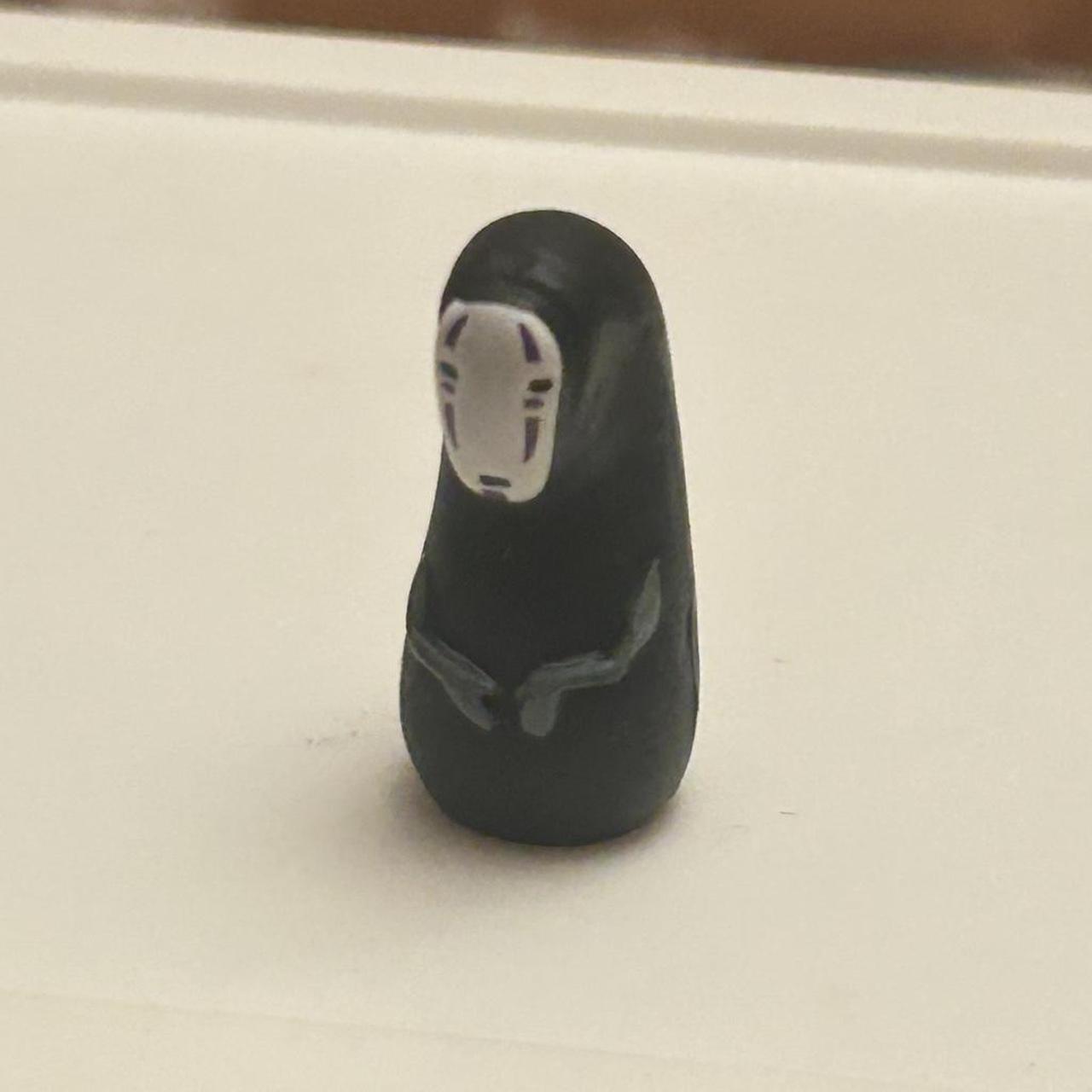mini no face figure - Depop