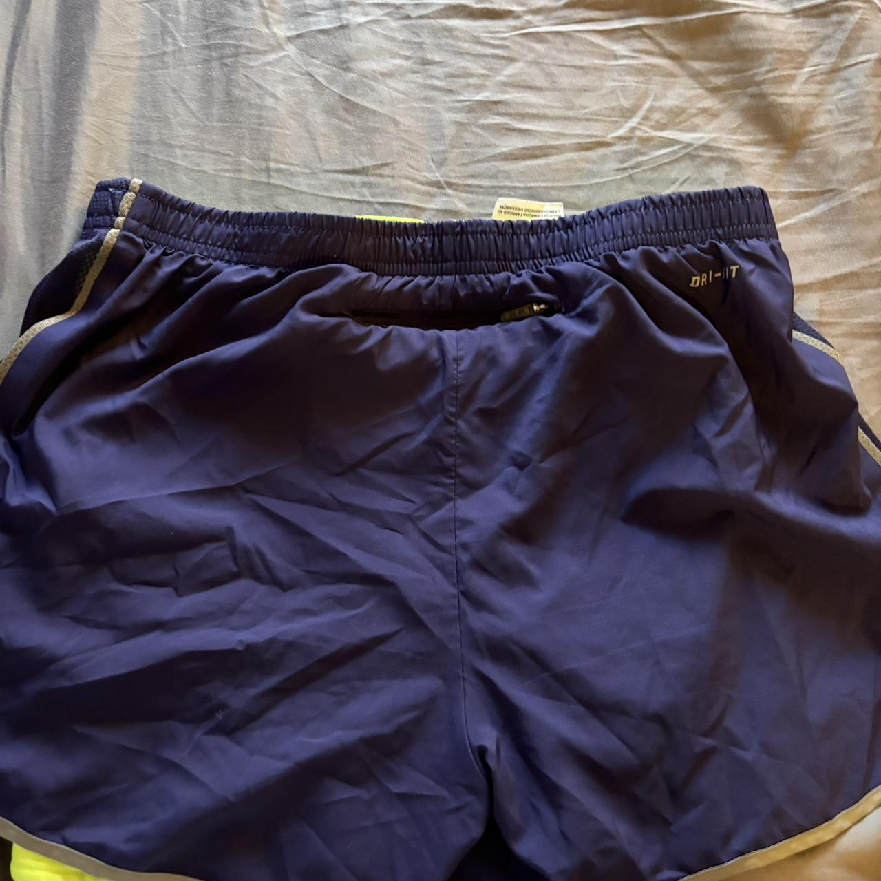 Nike dri-fit navy blue and lime running shorts with... - Depop