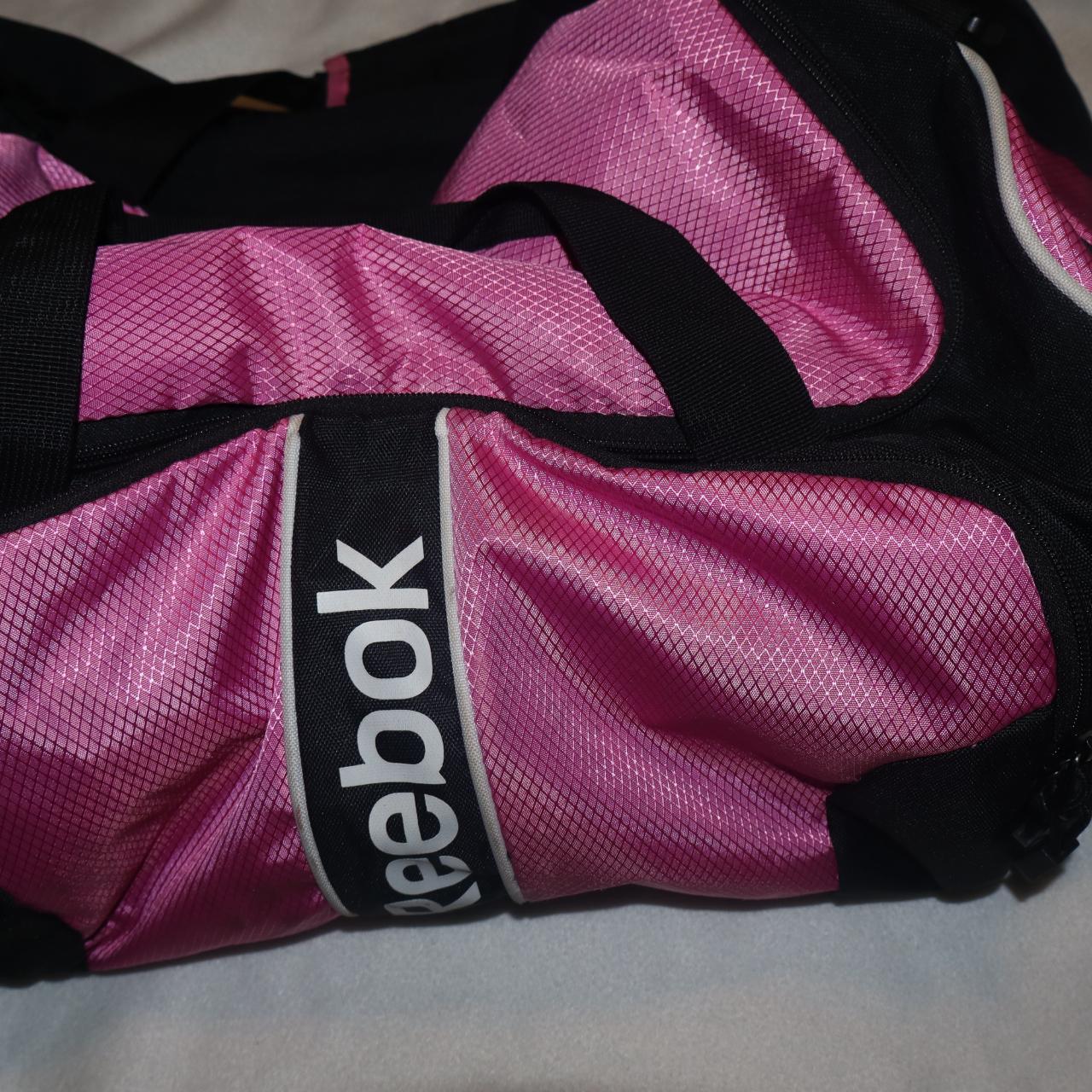 REEBOK Pink and Black Duffle Bag Great condition,... - Depop