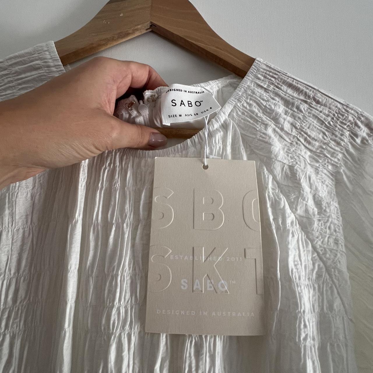 Sabo skirt white cut out midi dress with balloon... | Depop