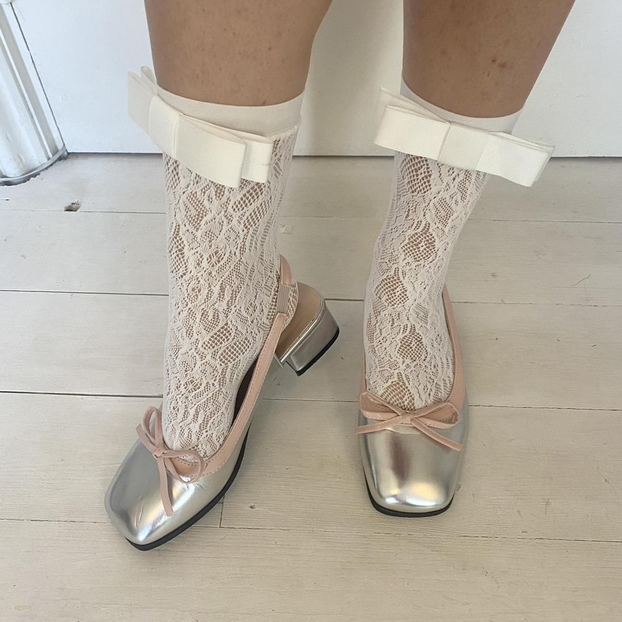 white fish net socks with bow detail so... - Depop