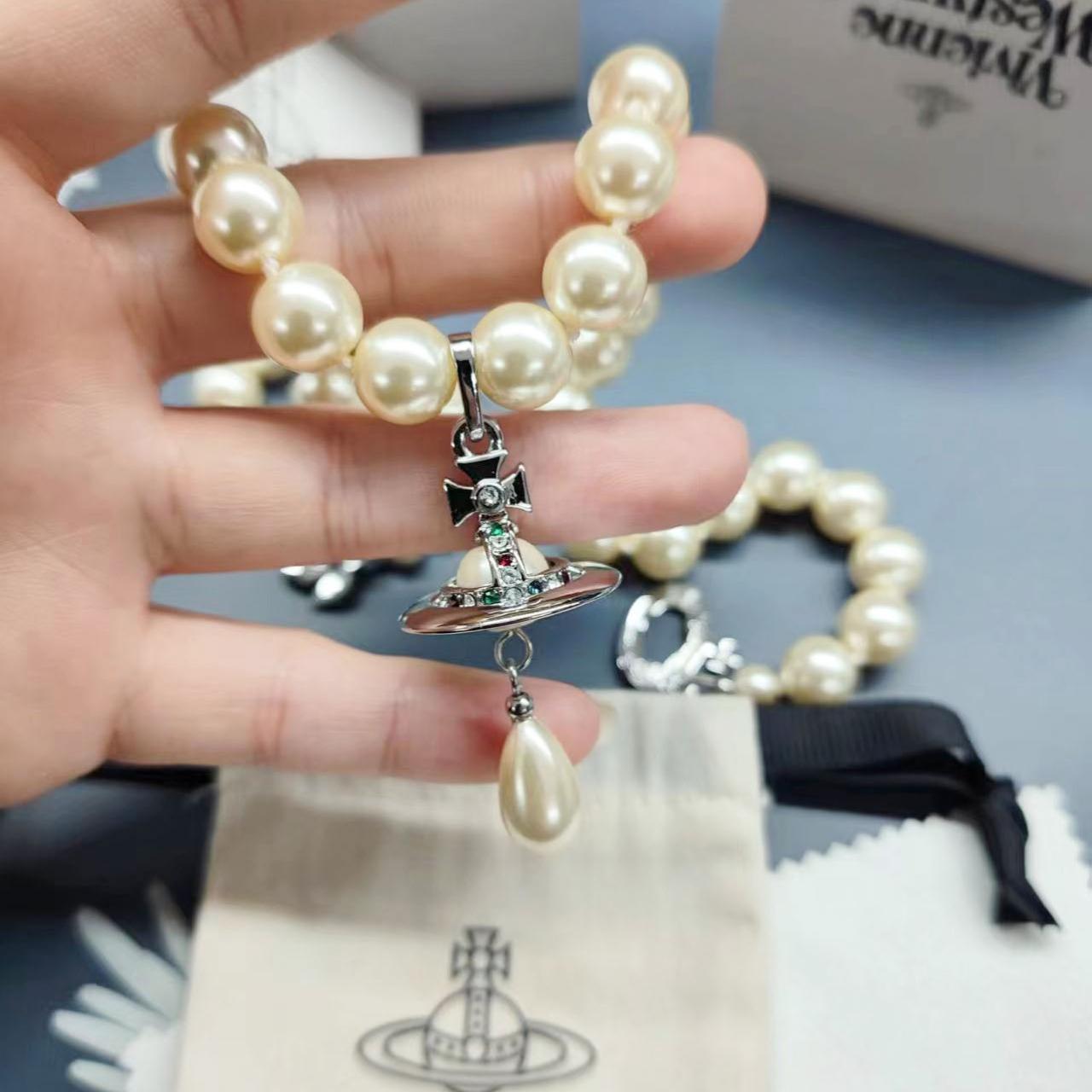 Vivienne Westwood necklace Snow white pearls strung... - Depop