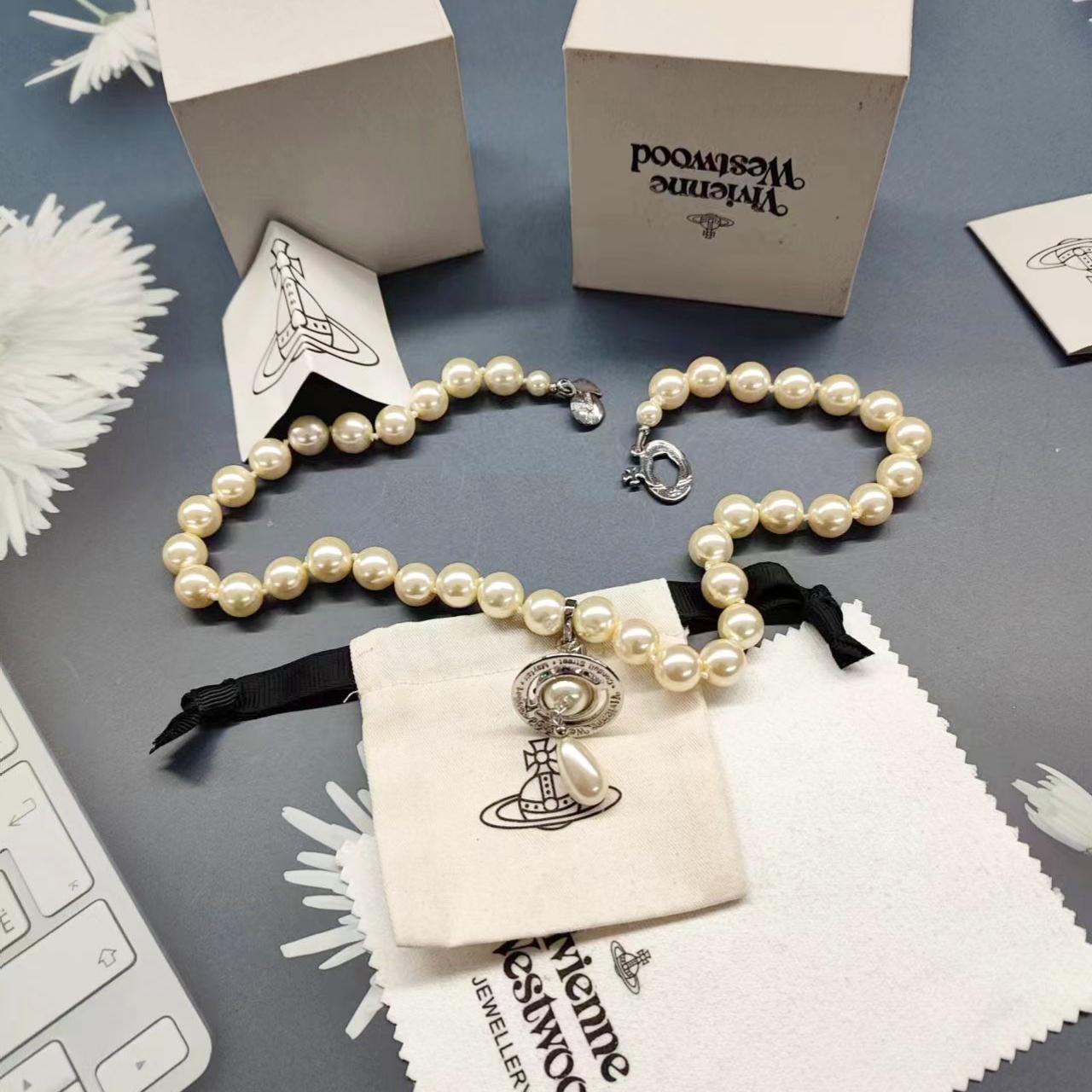 Vivienne Westwood necklace Snow white pearls strung... - Depop