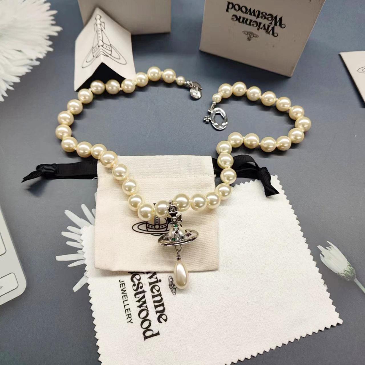 Vivienne Westwood necklace Snow white pearls strung... - Depop