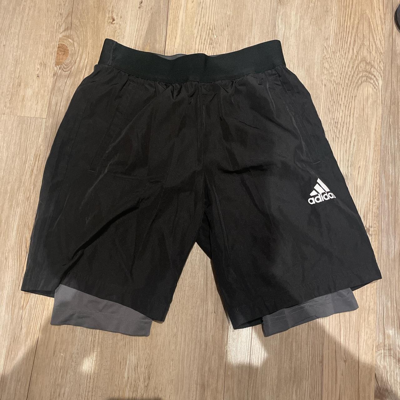 Kids black adidas shorts with built in... - Depop