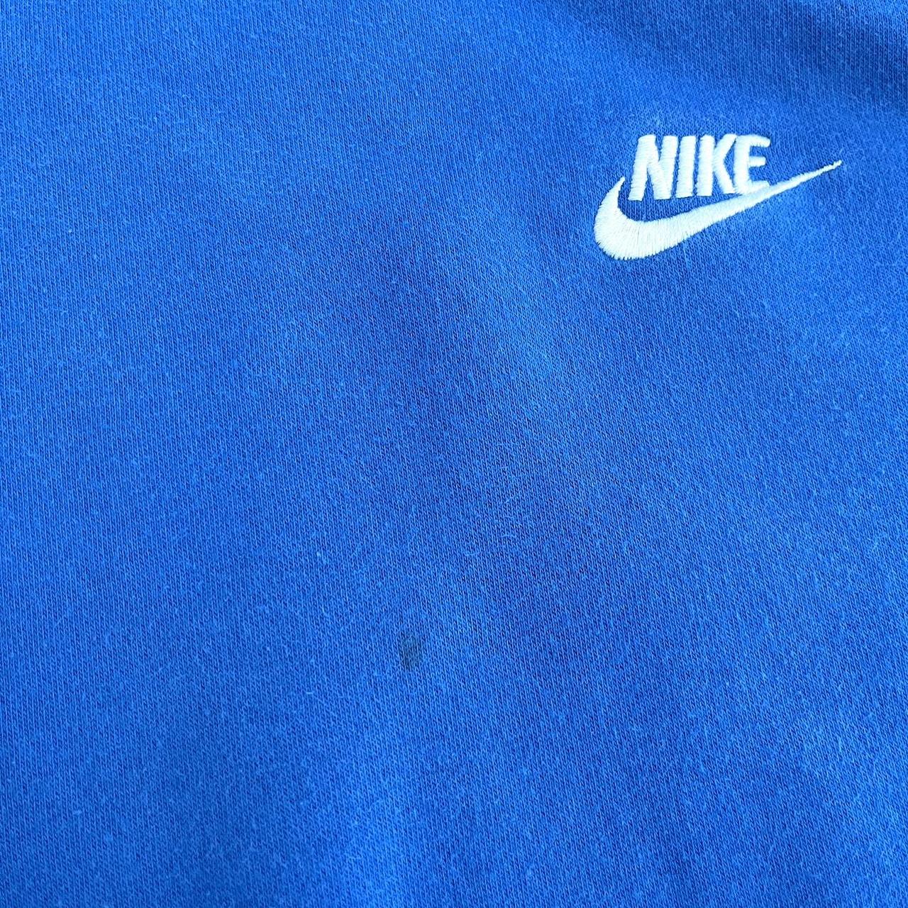 Blue Nike Jacket, Stains on Hood and Small Stain on... - Depop
