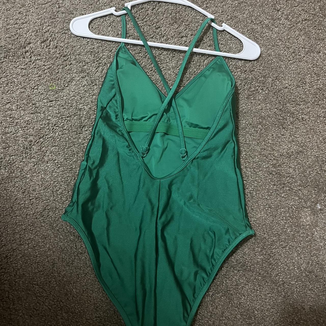 Green one-piece bathing suit. Never worn in... - Depop
