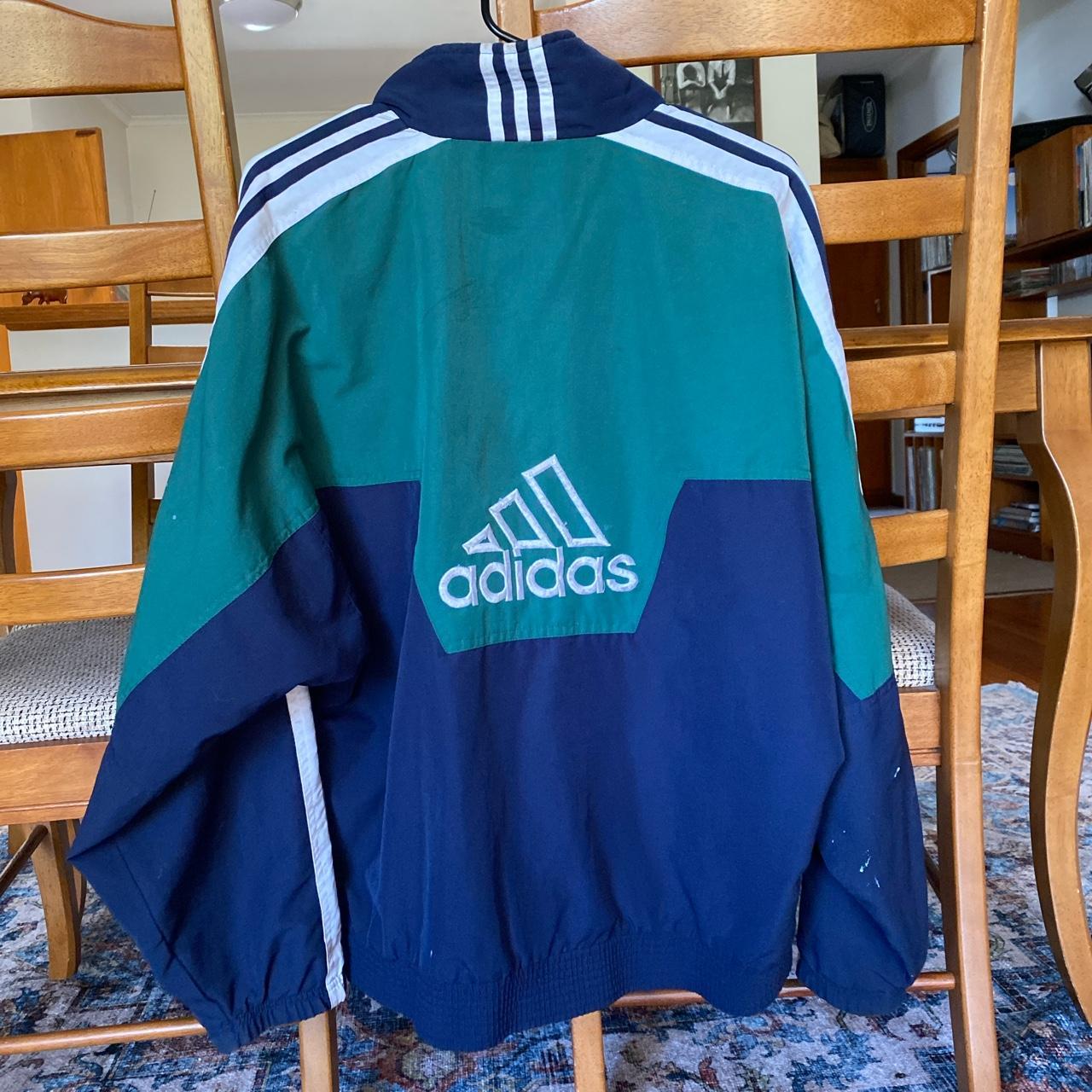M adidas unisex jacket visibly worn with a couple of... - Depop