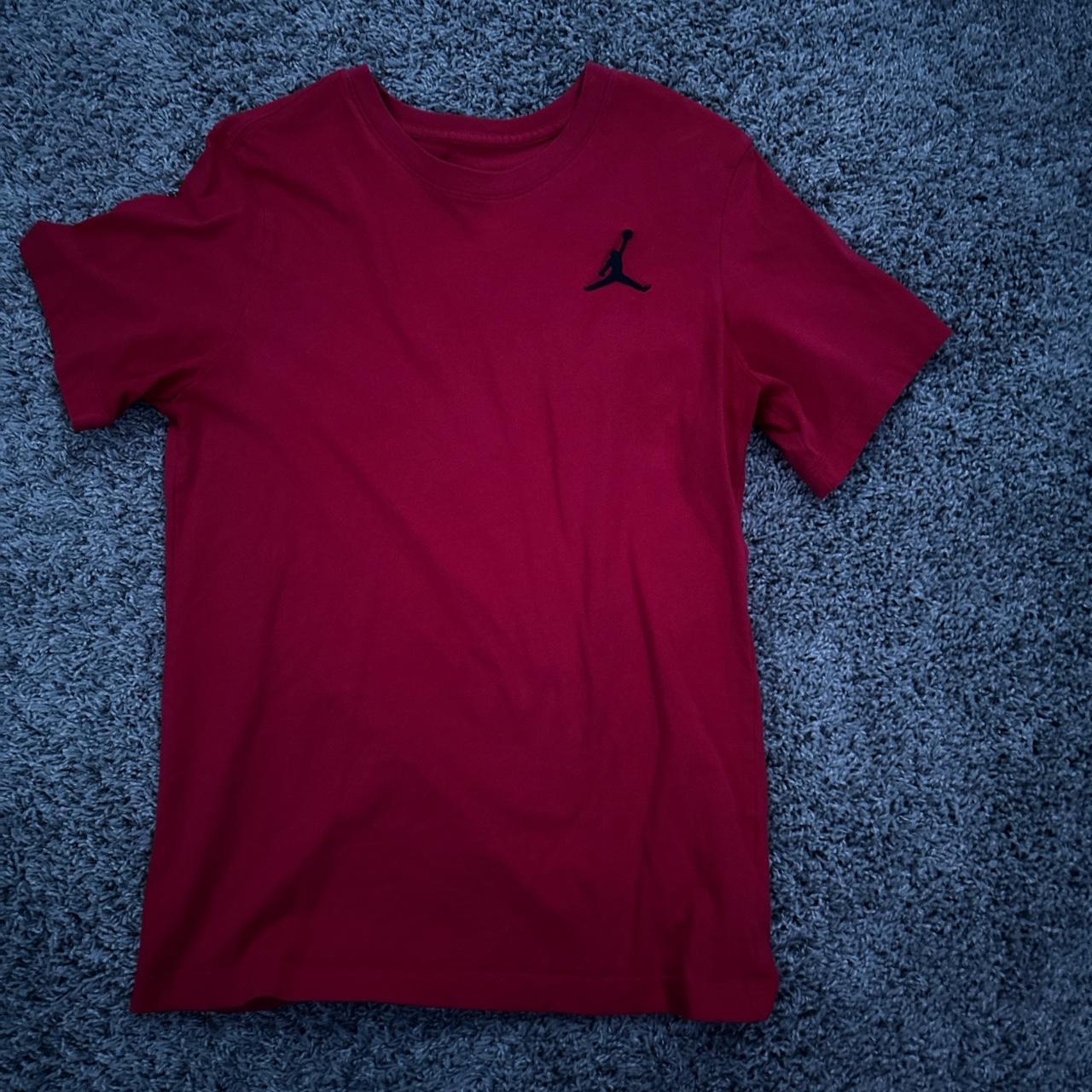 Red Jordan t-shirt. Says medium fits kinda tall... - Depop