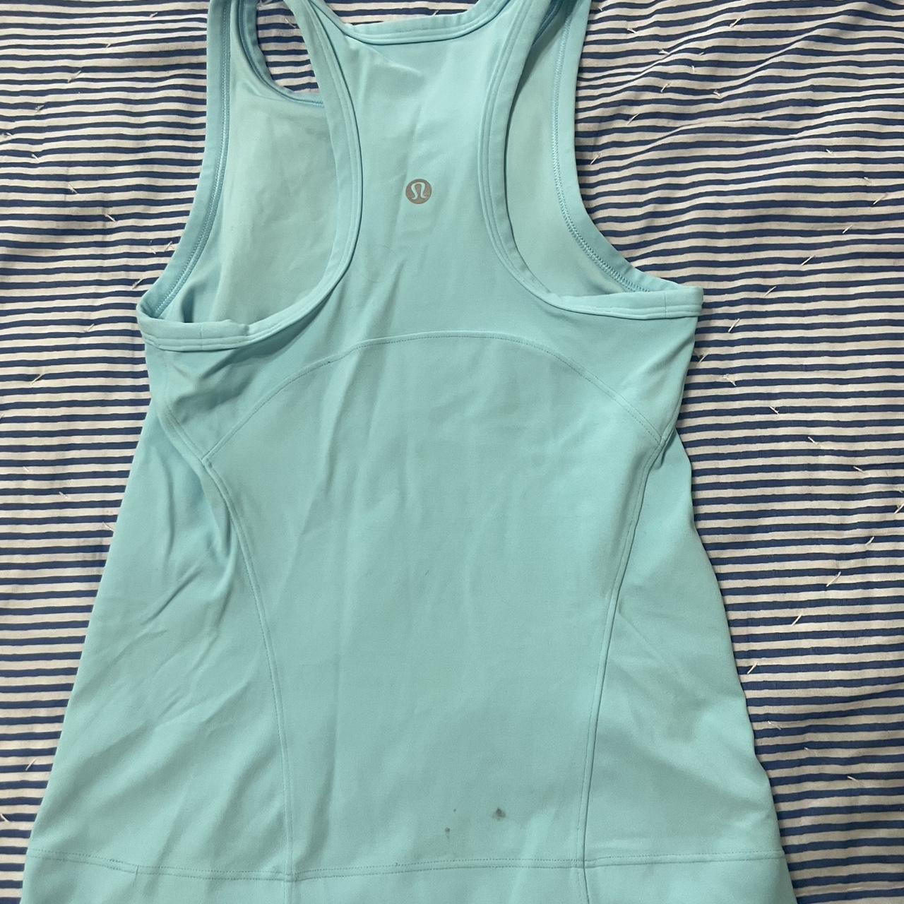Bright light blue lulu-lemon tank top size... | Depop