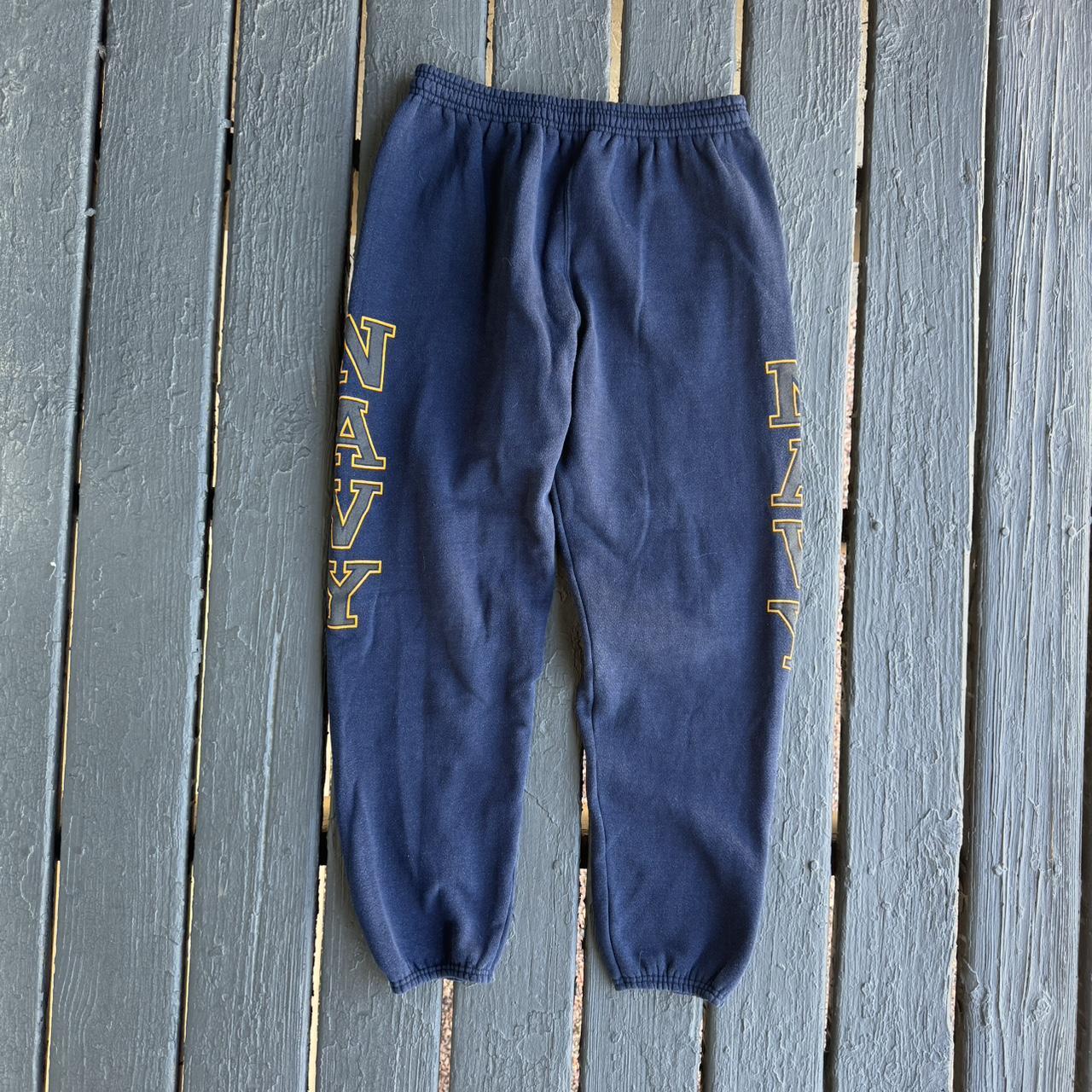 Navy blue vintage 90s sweatpants with yellow logo ... | Depop