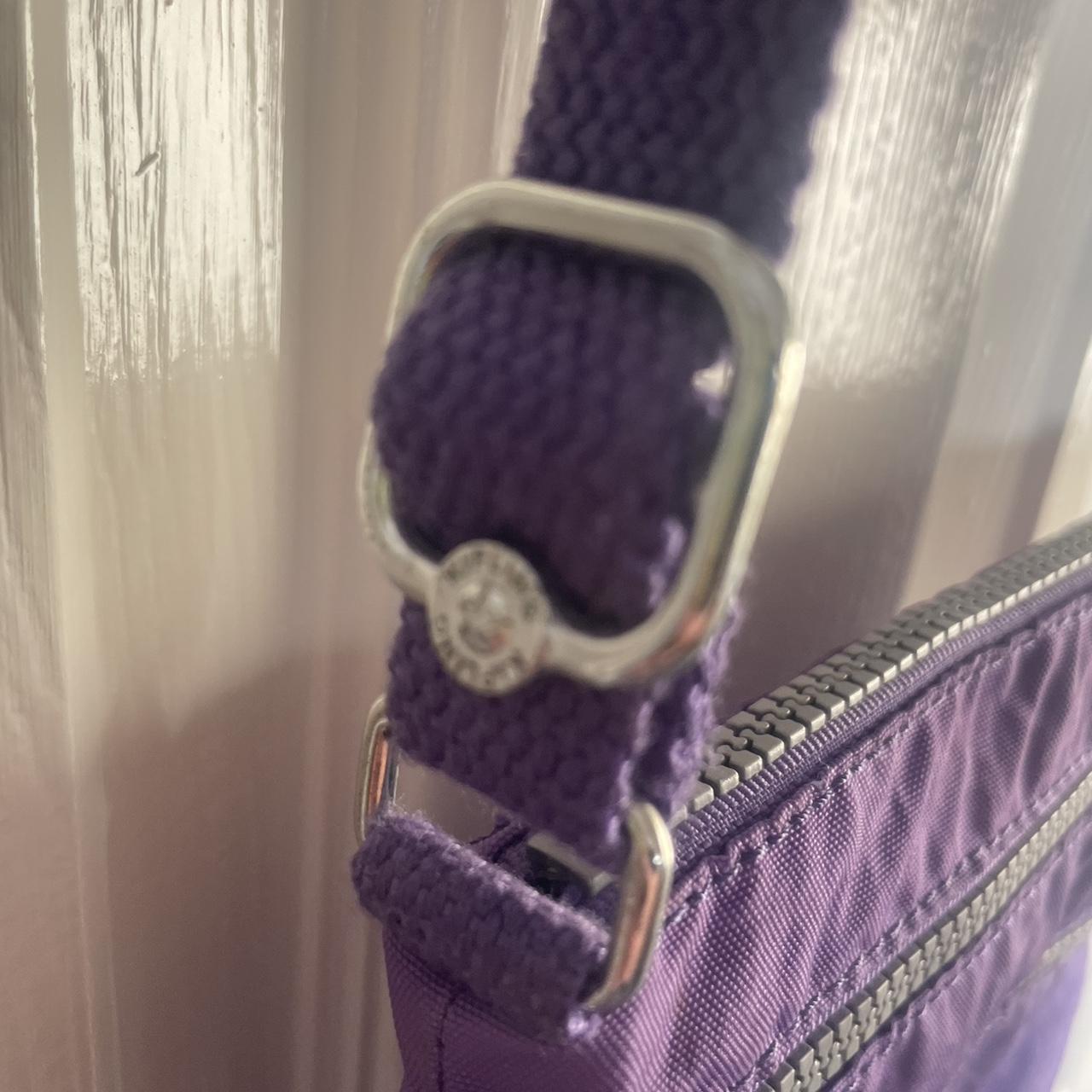 Purple small Kipling bag with an adjustable strap.... - Depop