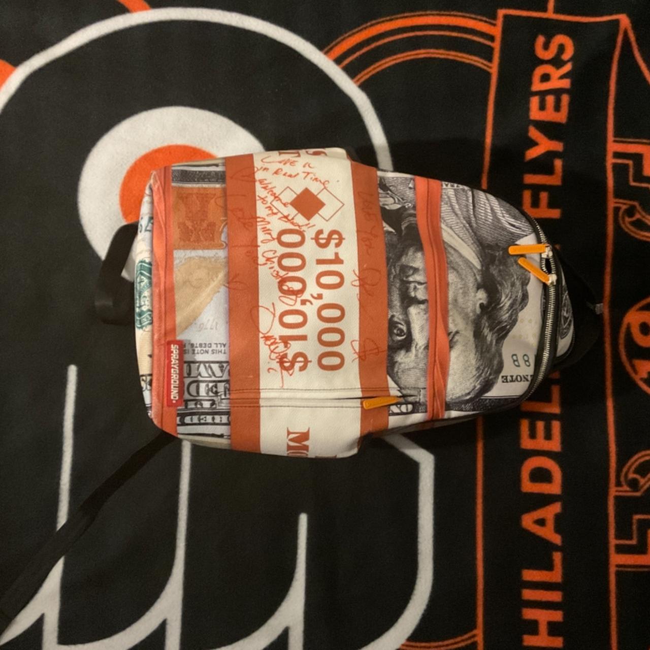 Money bag Sprayground backpack Signature formed by... - Depop