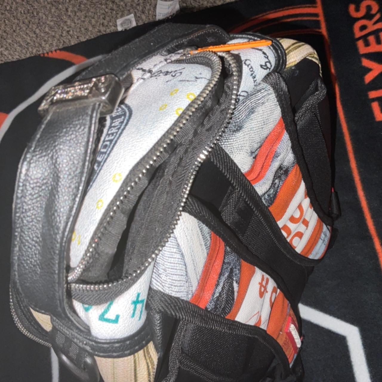 Money bag Sprayground backpack Signature formed by... - Depop