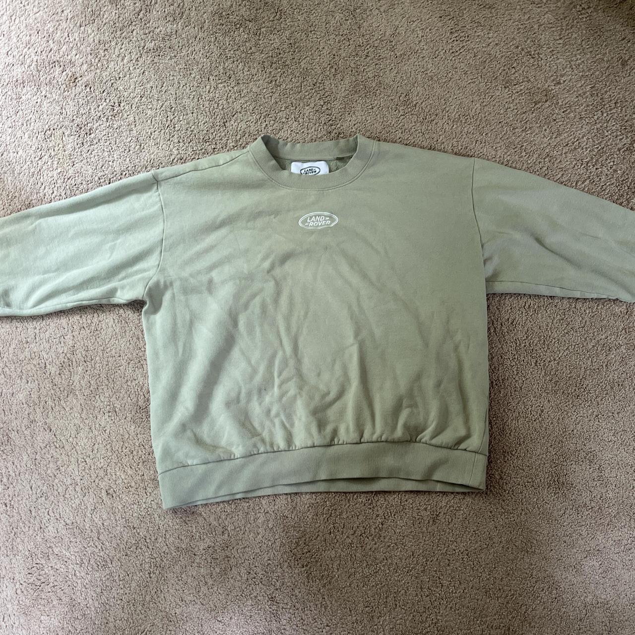 Land Rover crew neck slightly worn - Depop