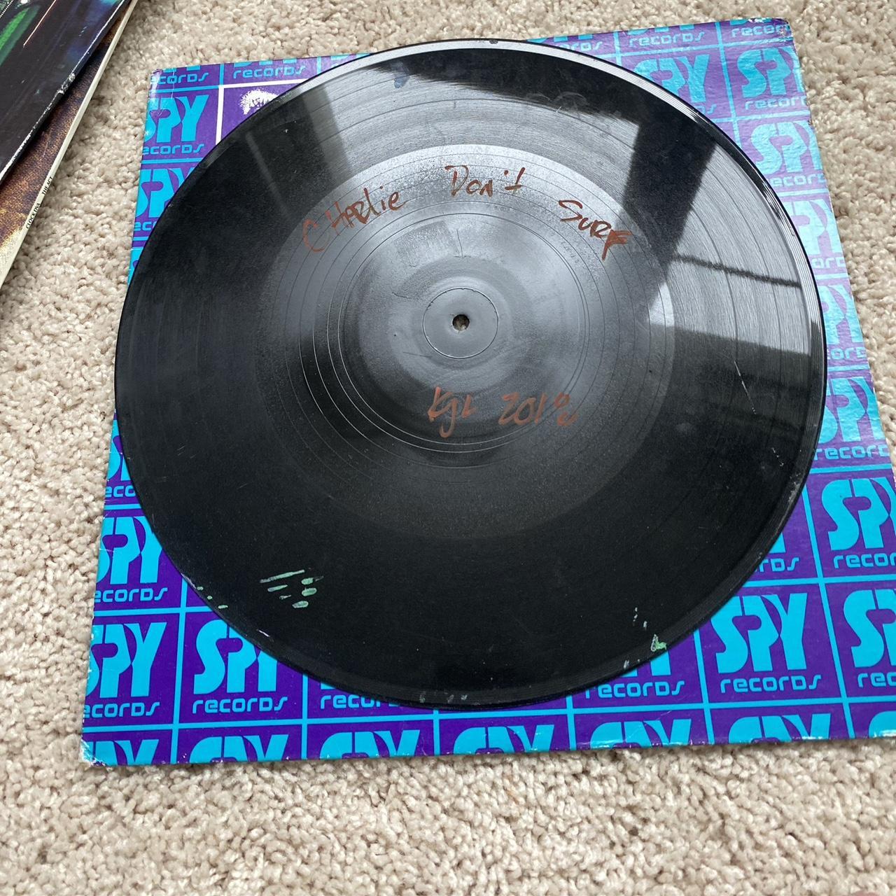 Vinyl records with Charles Manson painted /also have... - Depop