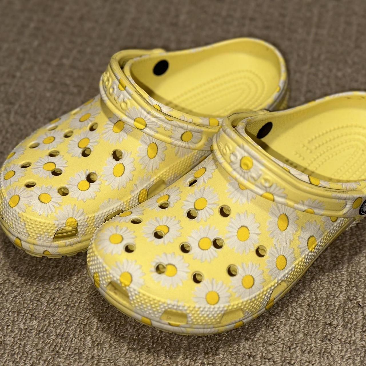 Yellow with white flowers CROCS. Worn a couple... - Depop