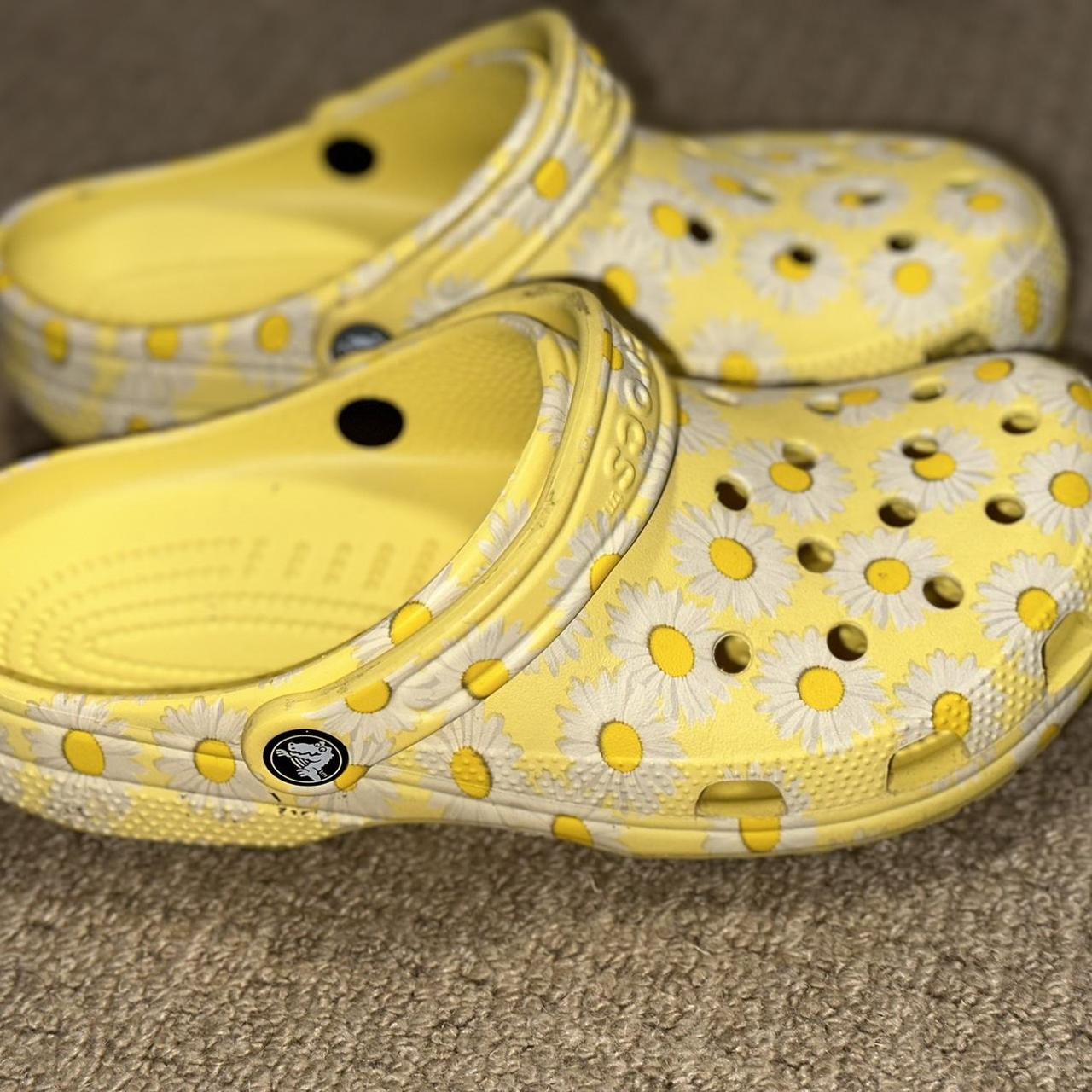 Yellow with white flowers CROCS. Worn a couple... - Depop