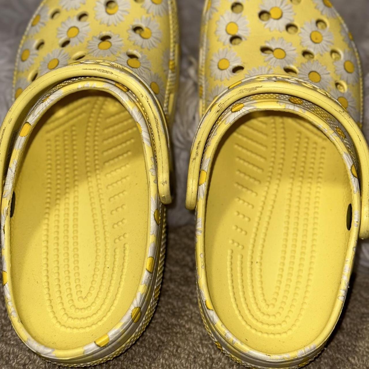 Yellow with white flowers CROCS. Worn a couple... - Depop
