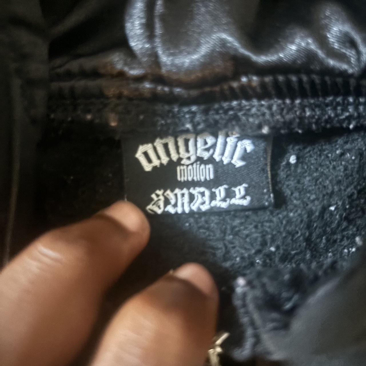 Angelic motion hoodie size small - Depop