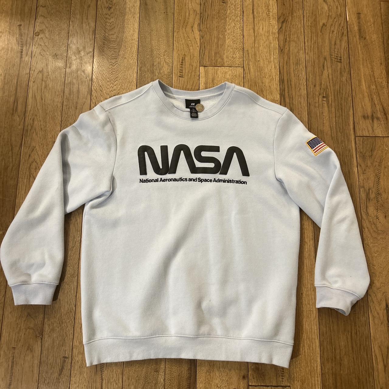 Lightly worn H&M nasa crewnick good quality Size L - Depop